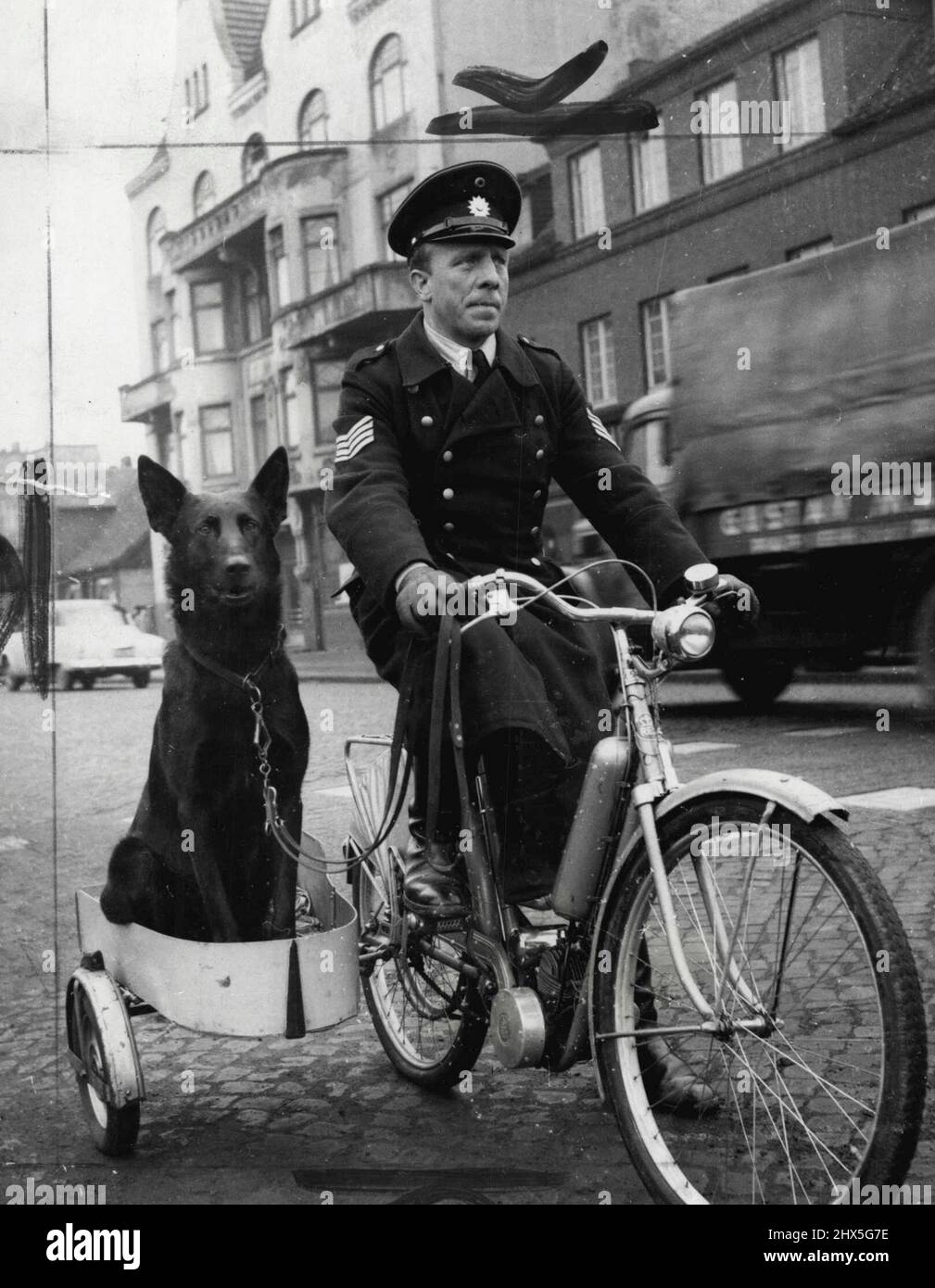 Policeman Johann Mueller, of Hamburg, Germany, with his trained police ...