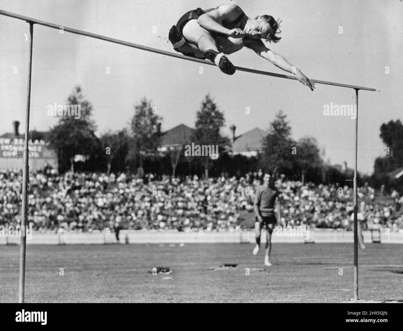 Just Over. J.H. Borland folds himself up to ***** the bar and win the ...