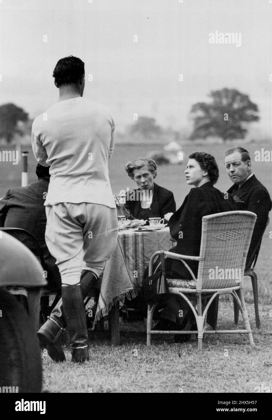 Queen Has Tea At Polo Ground. The Queen takes tea in the open at the ...