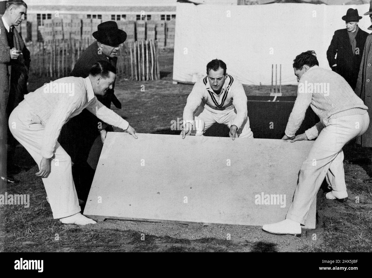 A New Concrete Cricket Pitch -- Left to Right: Len Muncer, of Glamorgan ...