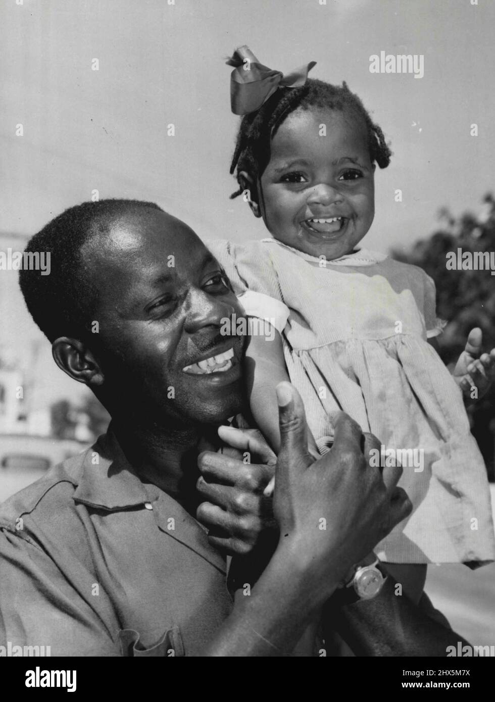 Helen Adderly, 18 months old, had a real vantage point - her father's ...