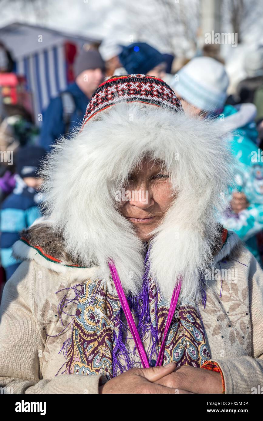 Nenet woman with a traditional reindeer fur headdress at Reindeer ...