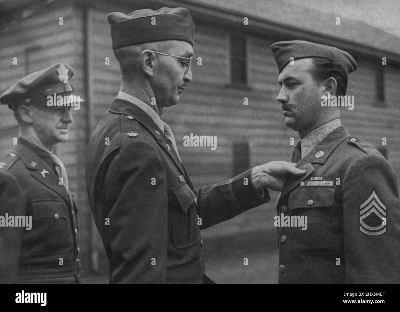 Decorated for Bravery : Lieut Colonel Forrest M. Carhartt, presenting ...