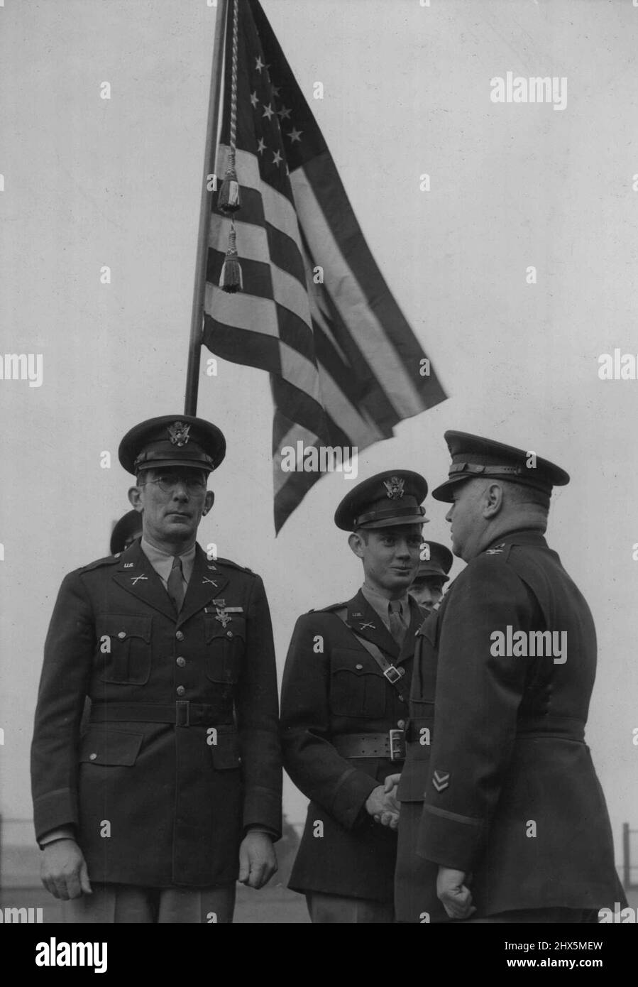 Awards For Bravery -- Colonel Frank Burns congratulating Second-Lieut ...