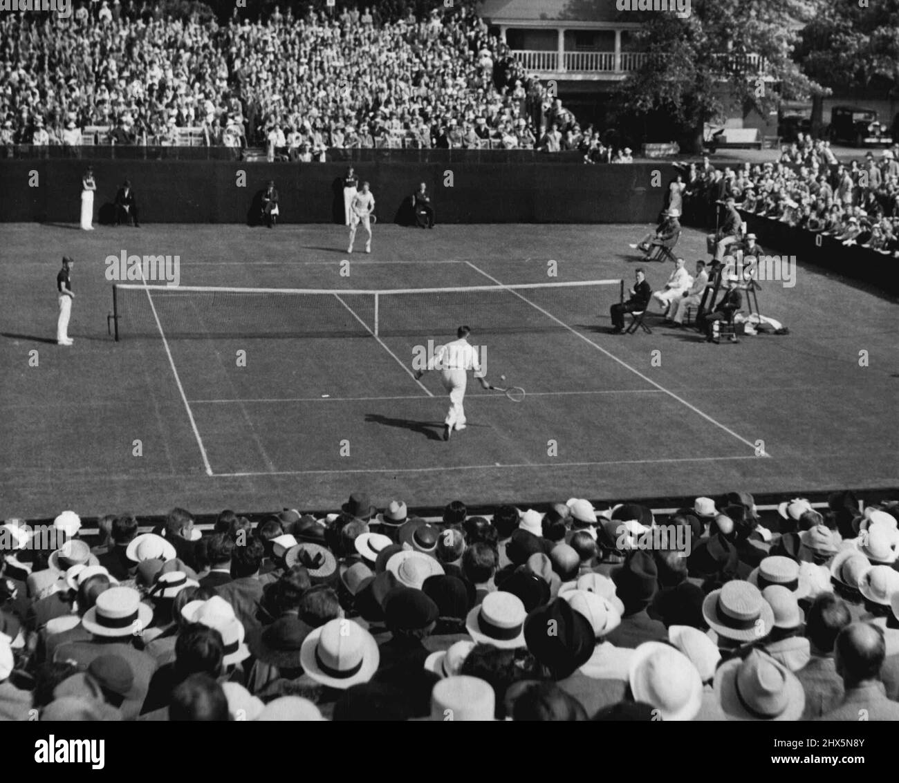 Quist-Allison in Action - Wilmer Allison and Adrian Quist are shown in ...