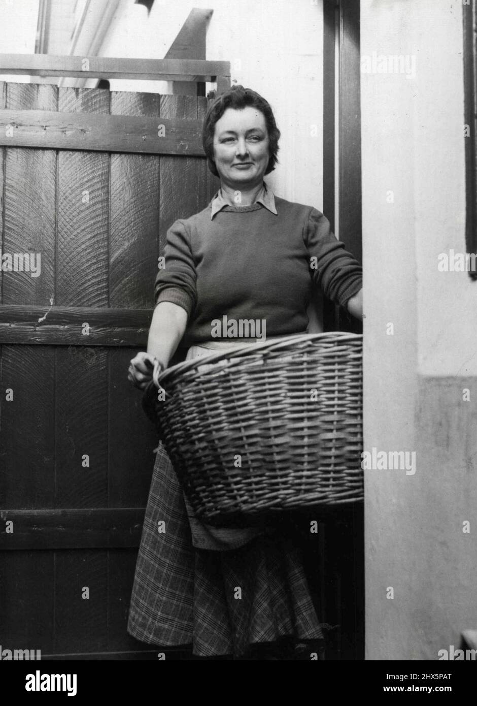 Ald. Marjorie Propsting at her laundry door. August 30, 1953 Stock ...
