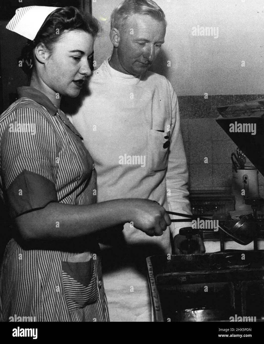 John Malaher shows nursing-aide Gillian Tipler how to sterllise bowl ...