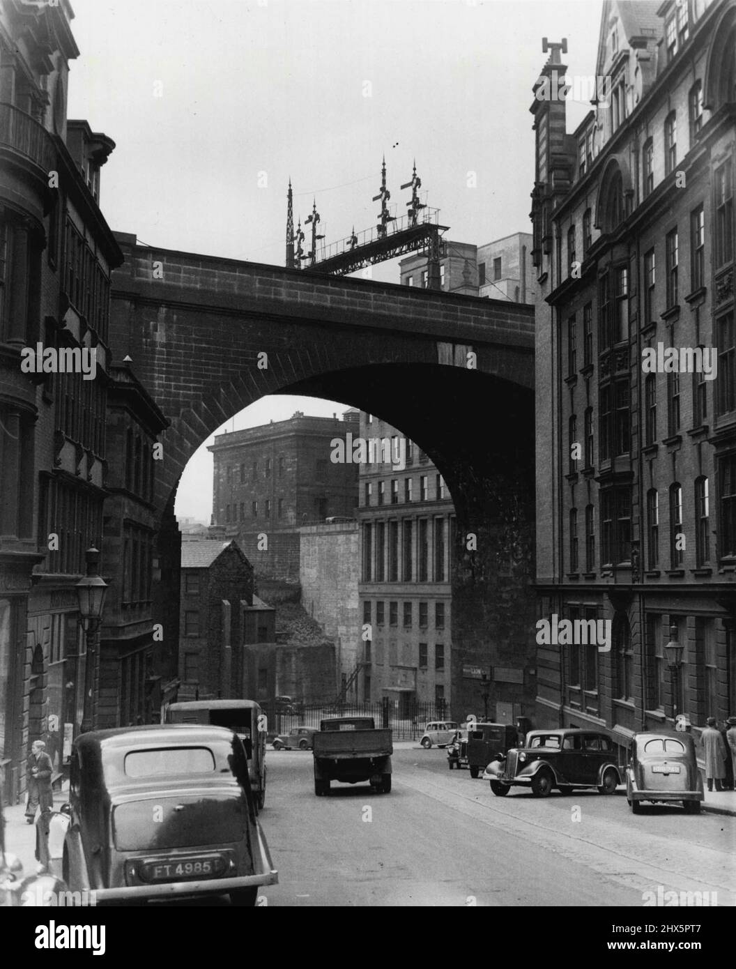 Newcastle-On-Tyne -- In the heart of the city: Traffic passes beneath a ...