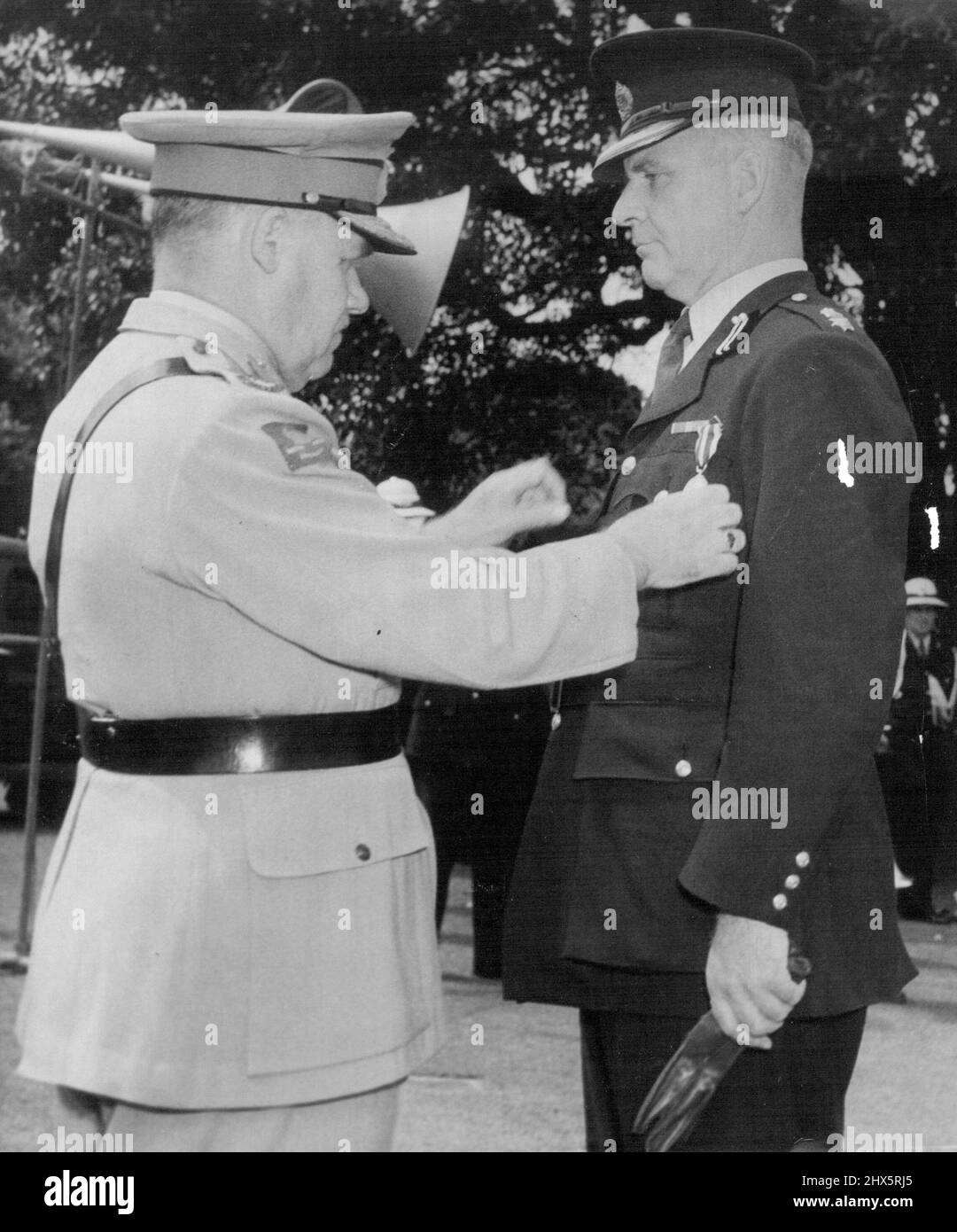 Supt. 3rd class George G Laing Smith receiving his Service Medal from ...