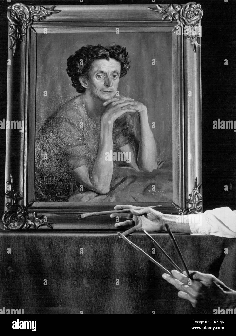 A painting by Joshua Smith of his sister, Included in the photograph ...