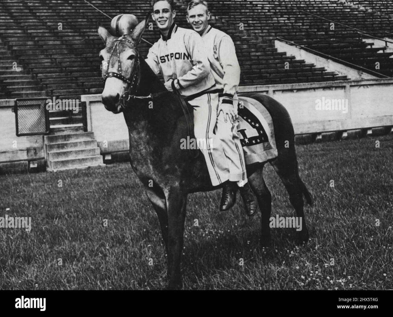19 The young men are astride the mascot of: (c) U.S.M.A. March 2, 1950 ...