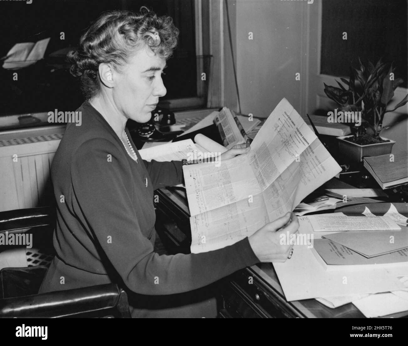 Rare Signatures-- A Document she values at $850 is held up by Mary A ...