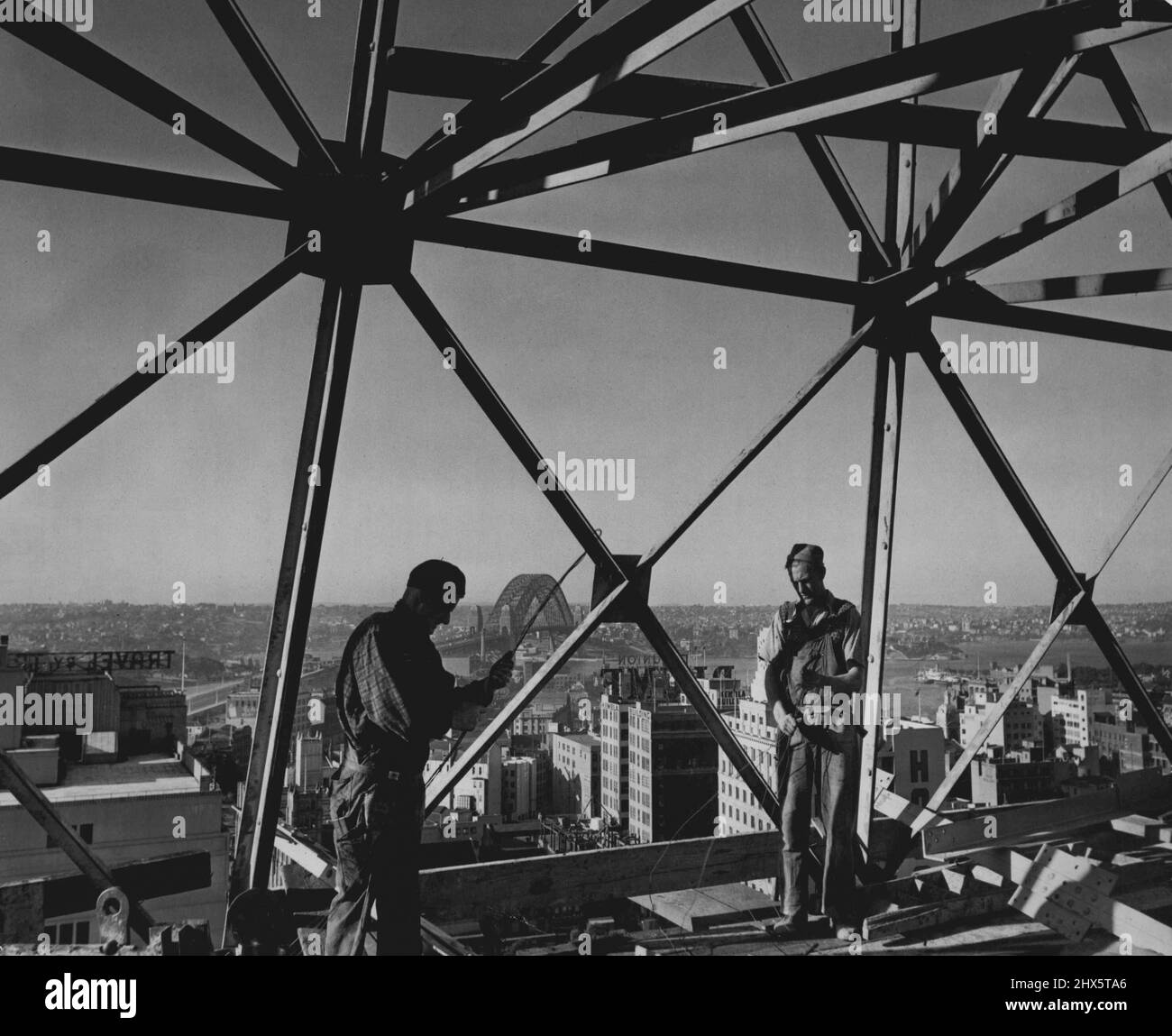 Men at work on the tower of the A.W.A. building. October 23, 1938 Stock ...