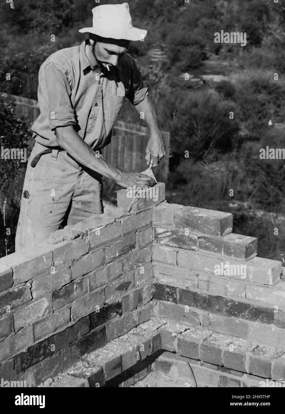 Bricklayer. August 9, 1945 Stock Photo - Alamy