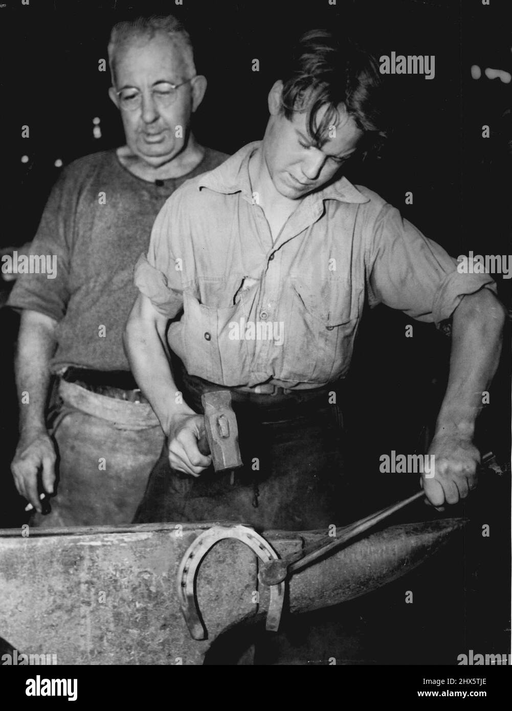 The final touches to a new shoe is done by Albert under the supervision ...