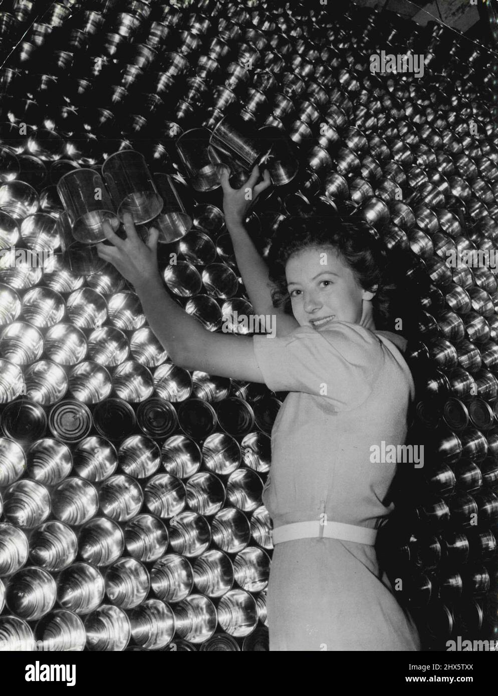 Reeton Cannery -- Maureen Harmer spends her time stocking newly made ...