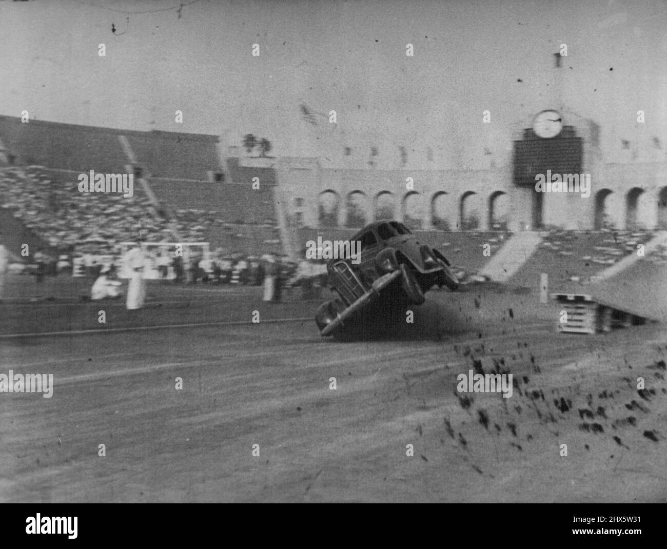 Stuntmen stage a spectacular crash to thrill visitors at the Los ...