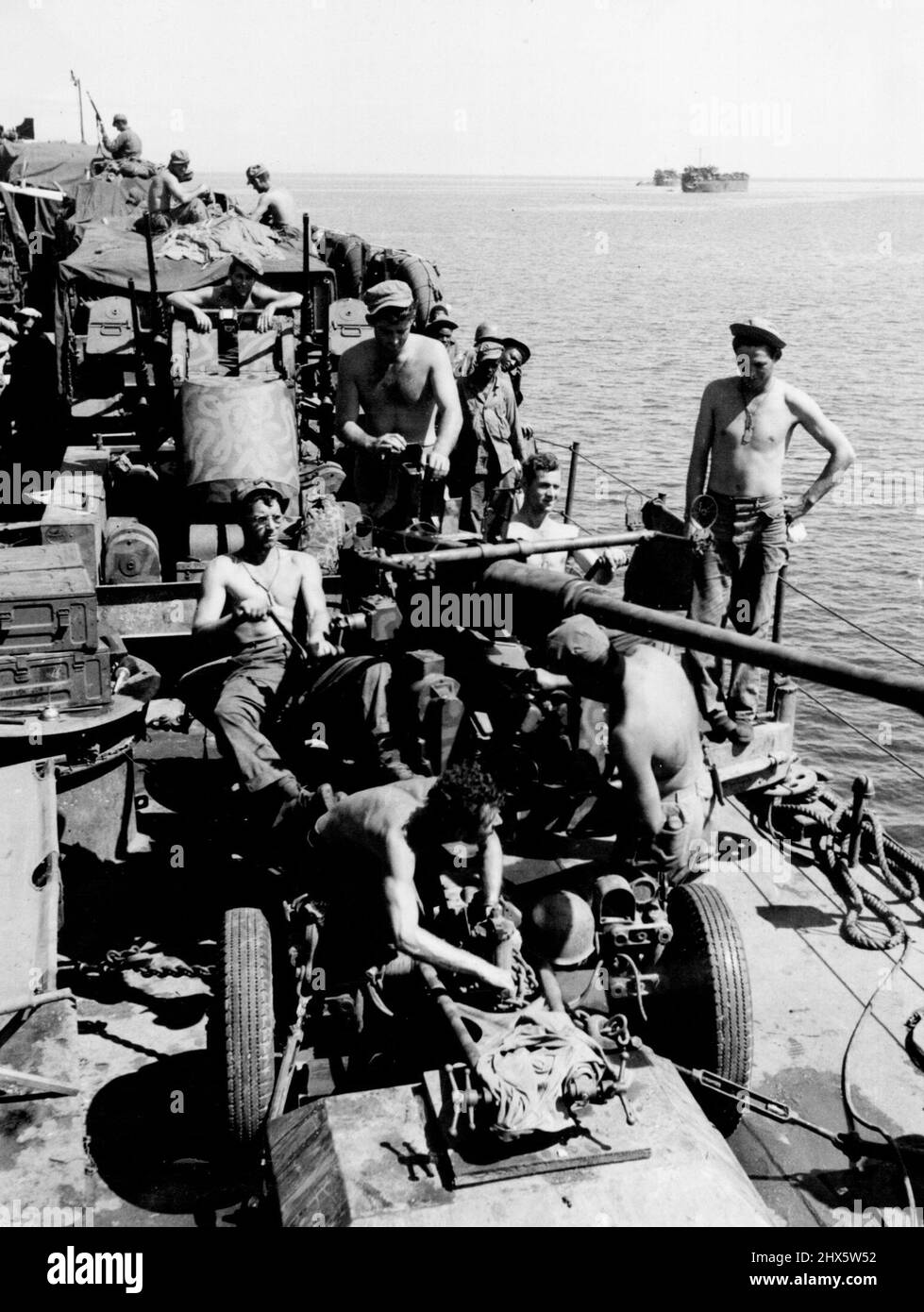 With Allied Landing Craft In A Pacific Landing -- Getting their gun ...