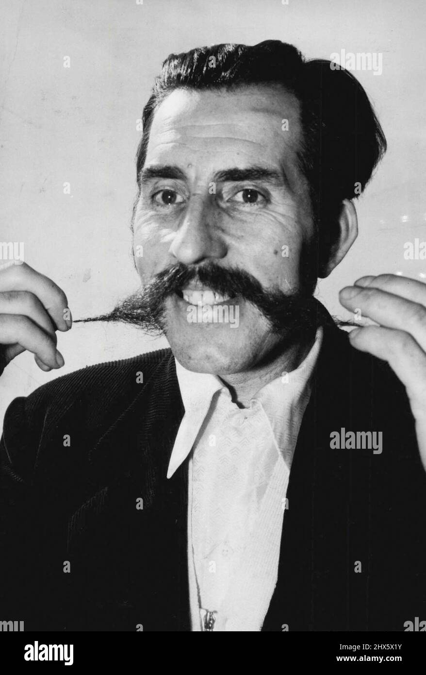 He's a cockney barrow boy a handlebar moustache that would be the envy ...