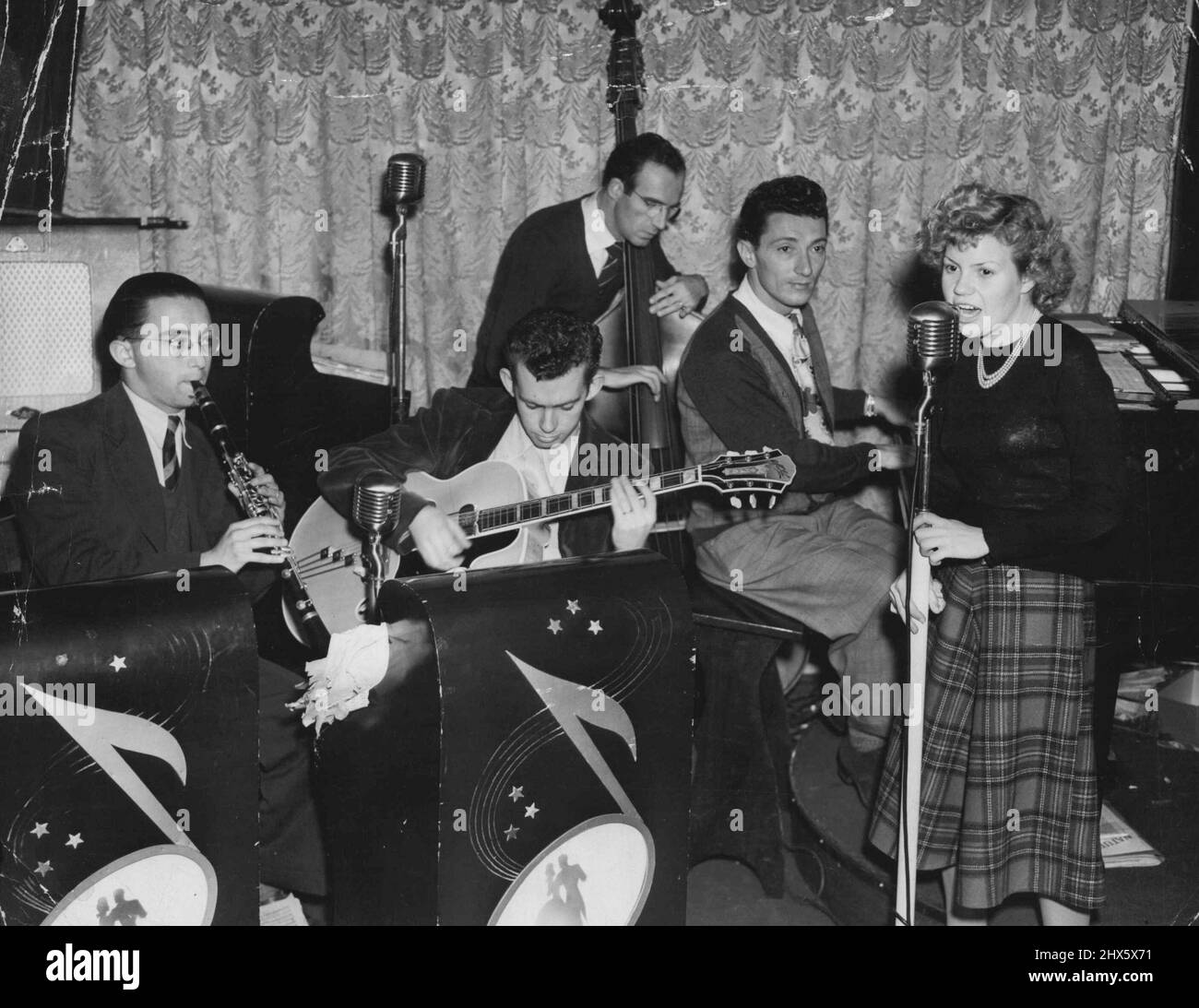 rehearsal in the cardigan to which he is firmly attached. Band shows ...