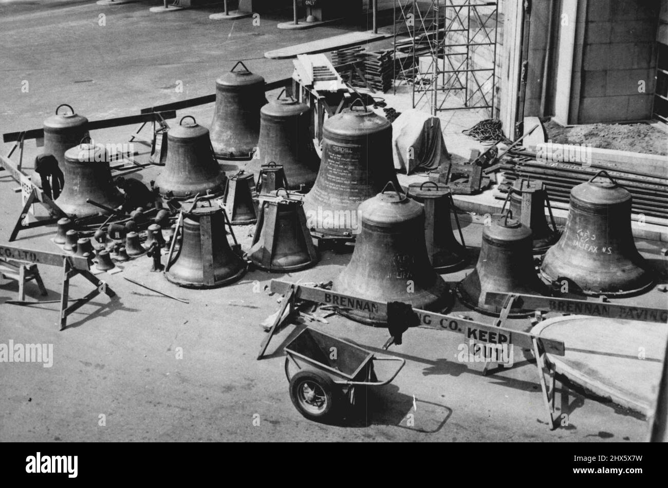 Carillon Bells Arrive -- Here workmen are shown, at left, completing ...