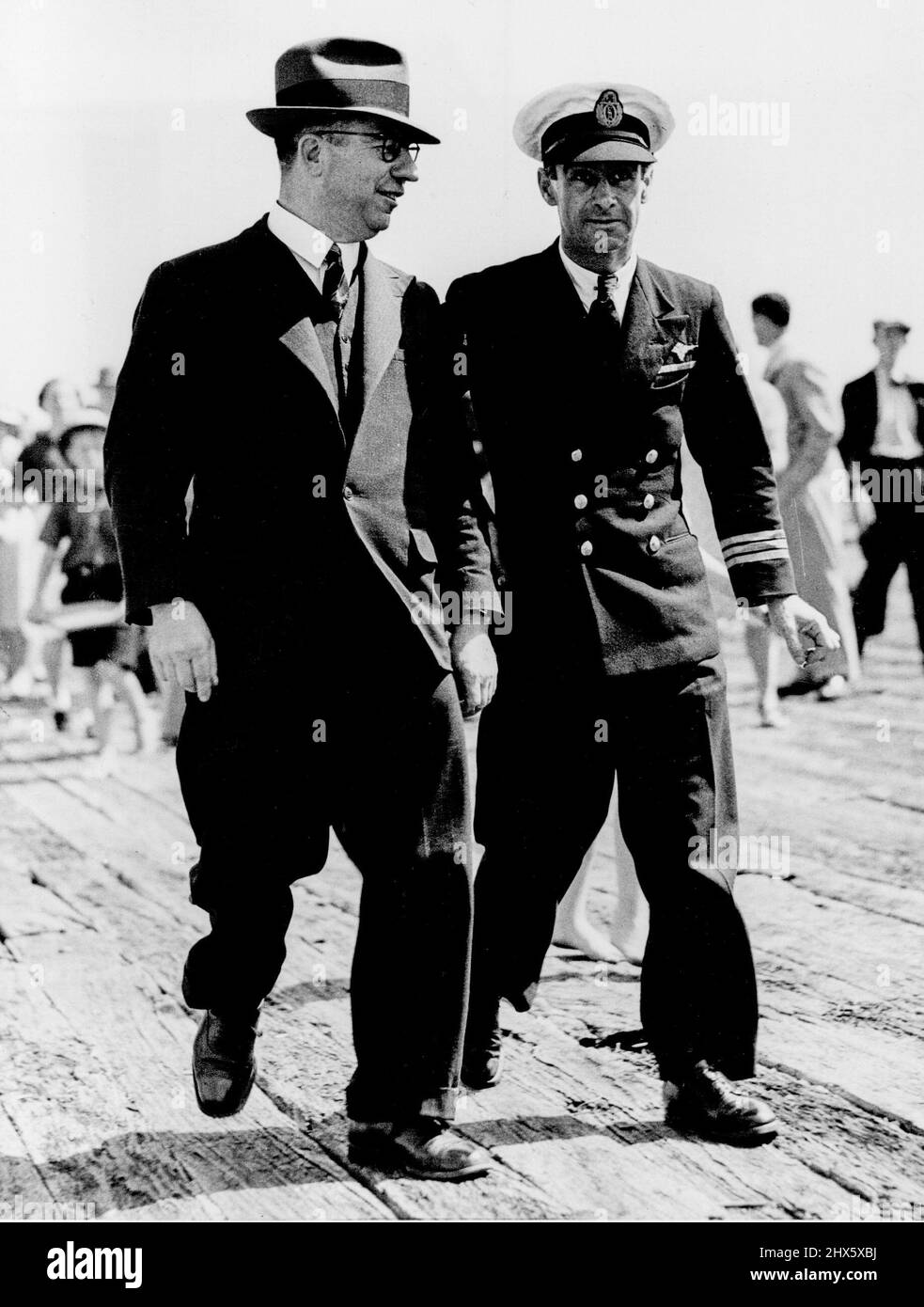 Captain G. U. Allan, who was in command, talking with Senator Fell, who ...