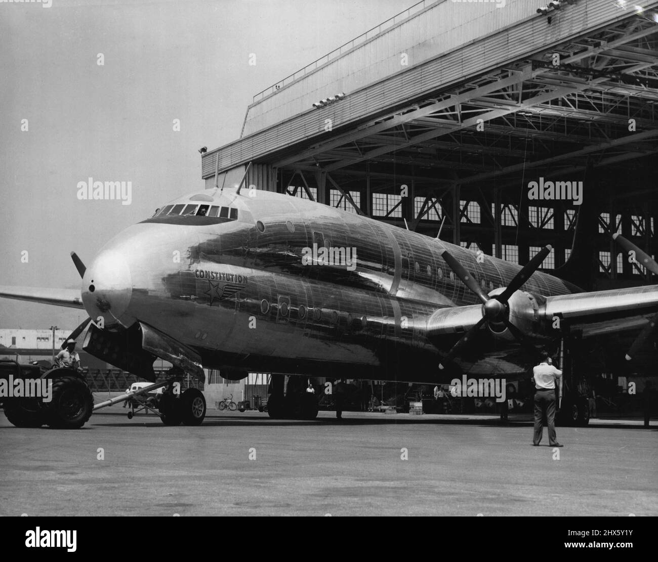 Towering Over Six-foot Men, the gleaming nose of Lockheed's giant ...