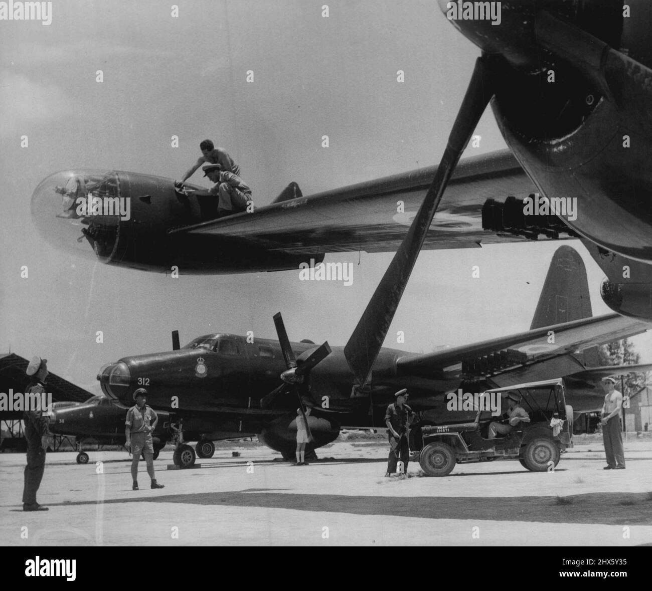 Neptune bomber anti-submarine squadron aircraft being checked on Momote ...