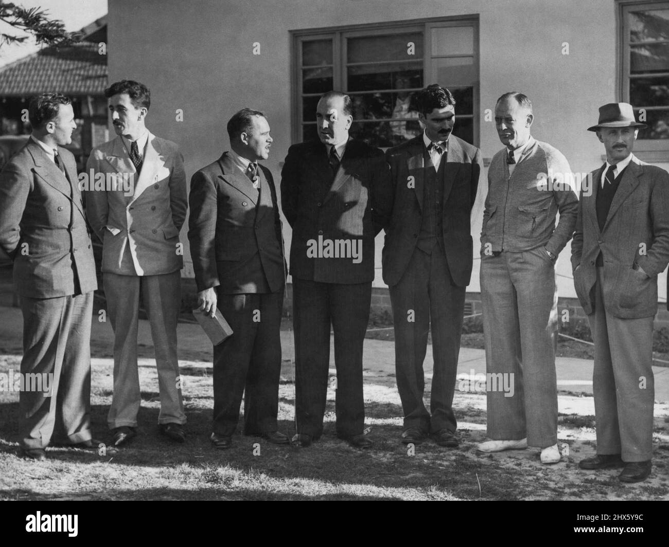 The Guba crew line up with the Post-Master-General (Mr Harrison) who ...