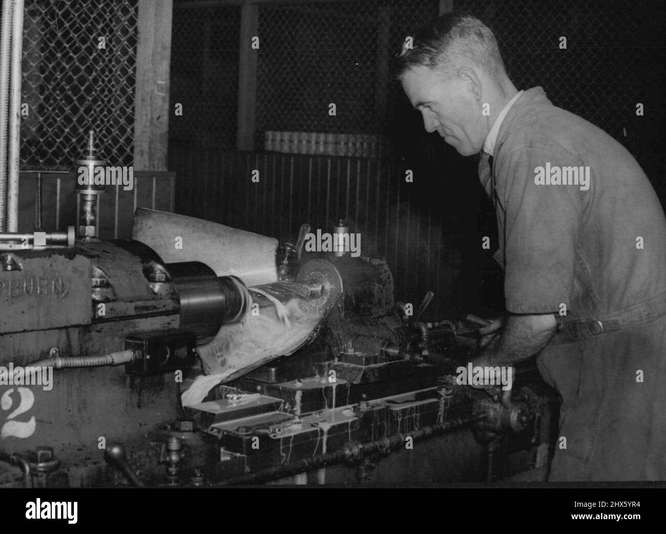 Drilling out inside of Shell casing ***** in Australia. August 08, 1940 ...