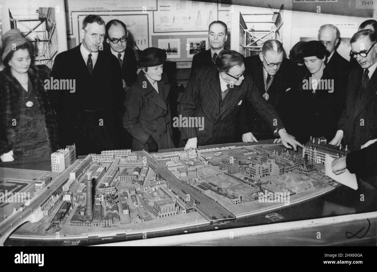 To Beautify Loncon - Mr. Herbert Morrision (centre) examining the model ...