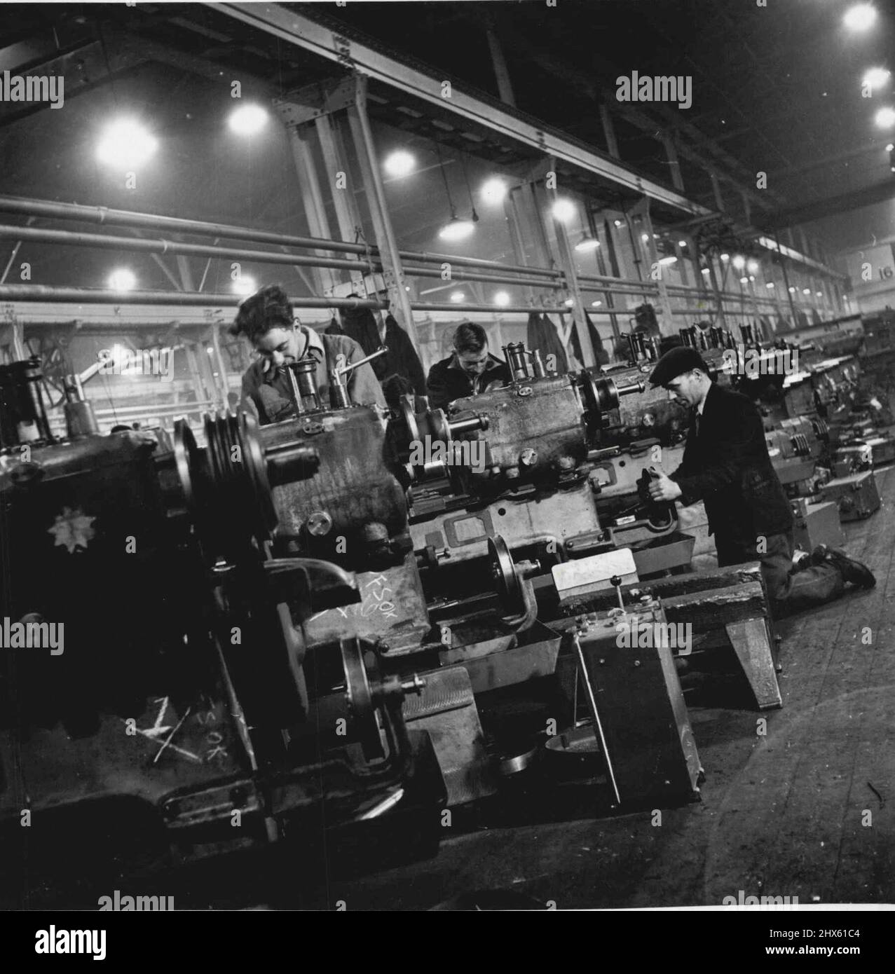 A long line of medium-sized capstan lathes in the last stage of ...