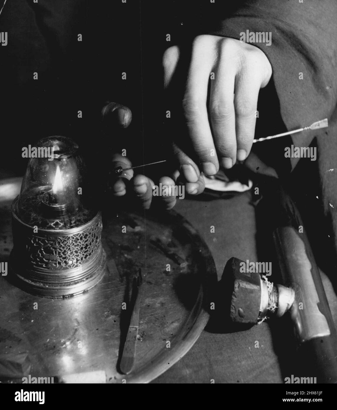 The Technique And Practice Of Opium Smoking -- Testing the temperature ...