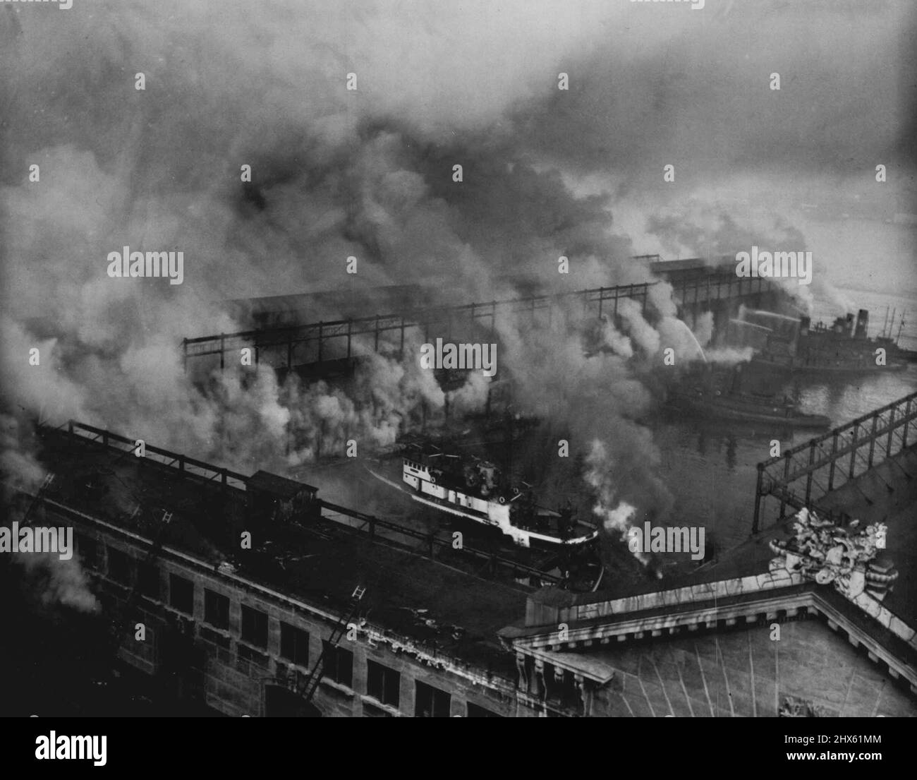 Smoke Billows From Pier Blaze -- A huge pall of smoke rises from pier ...