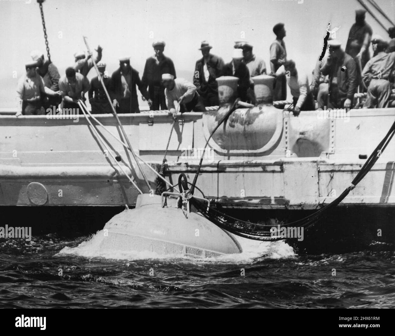 Diving Bell Lowered To Sunken Submarine -- Members of the salvage ...