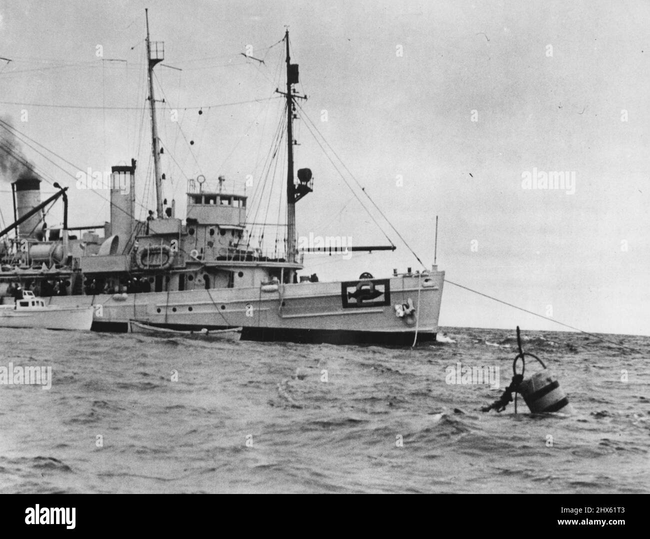 The Submarine Squalus Lies Helplessly Below -- The rescue ship Falcon ...