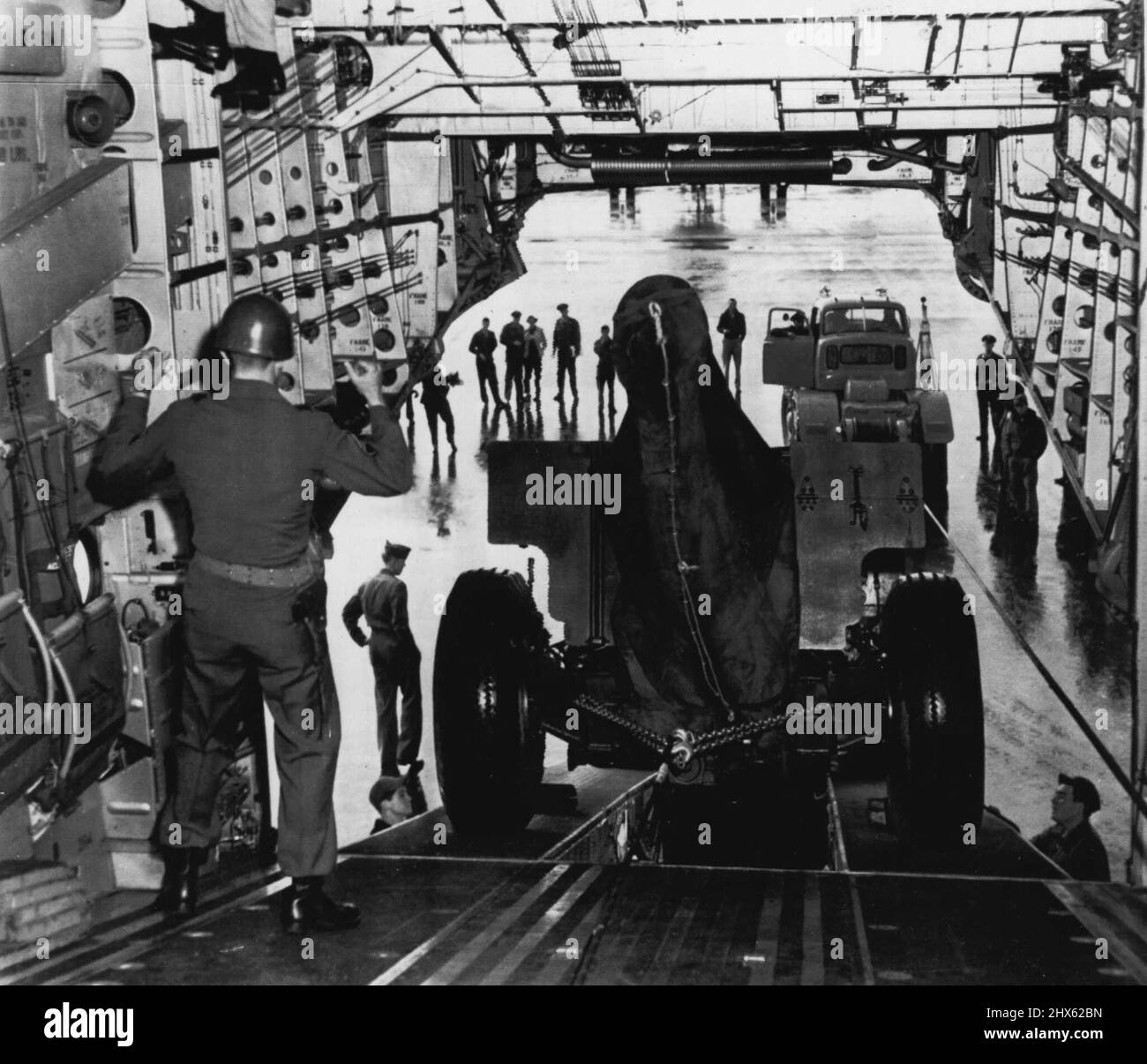 It's Spacious -- Giant Globemaster C-124 is loading 155 mm howitzer and ...