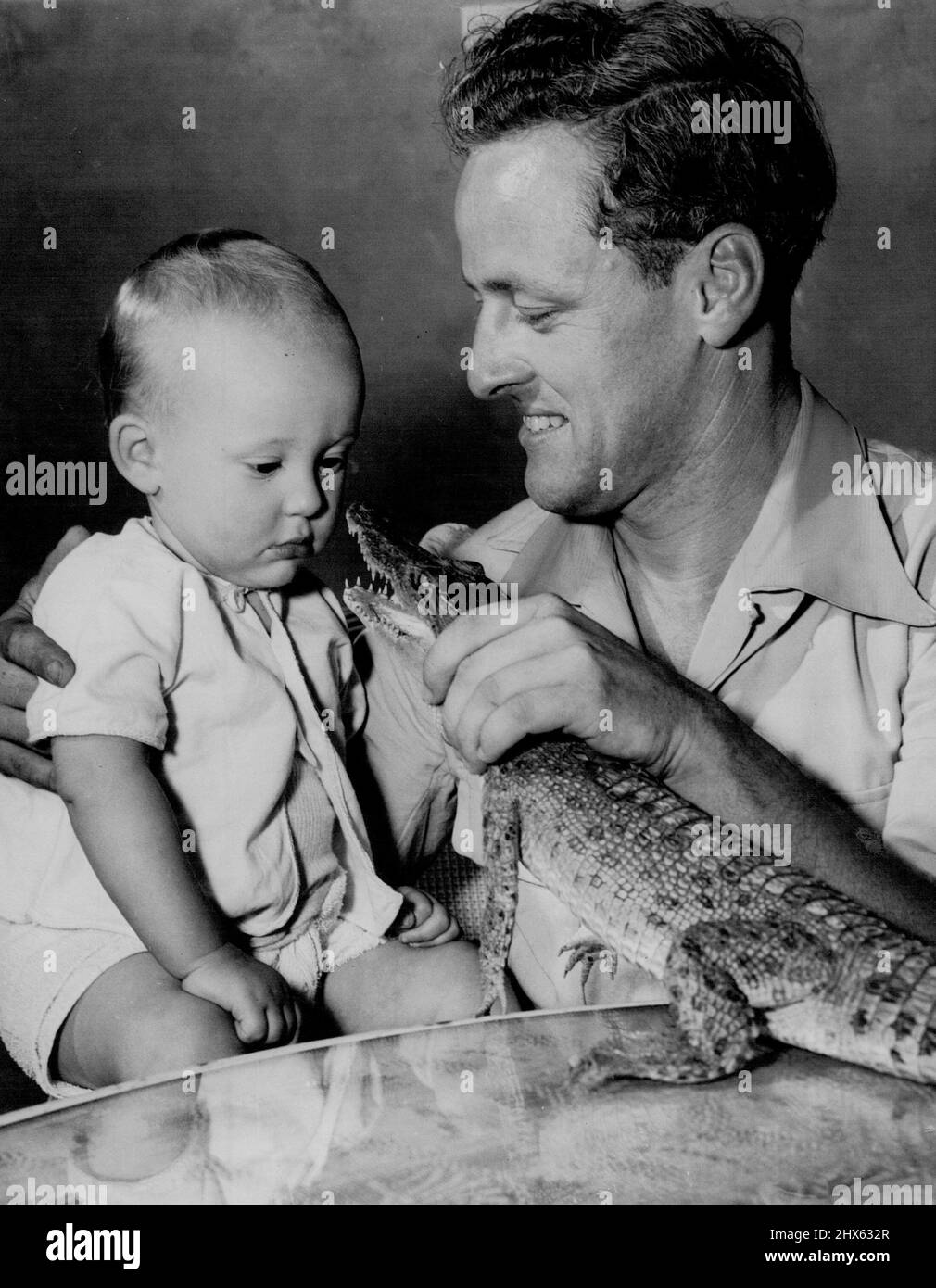Eric Worrell, his daughter Kim and a baby crocodile. Like her father ...