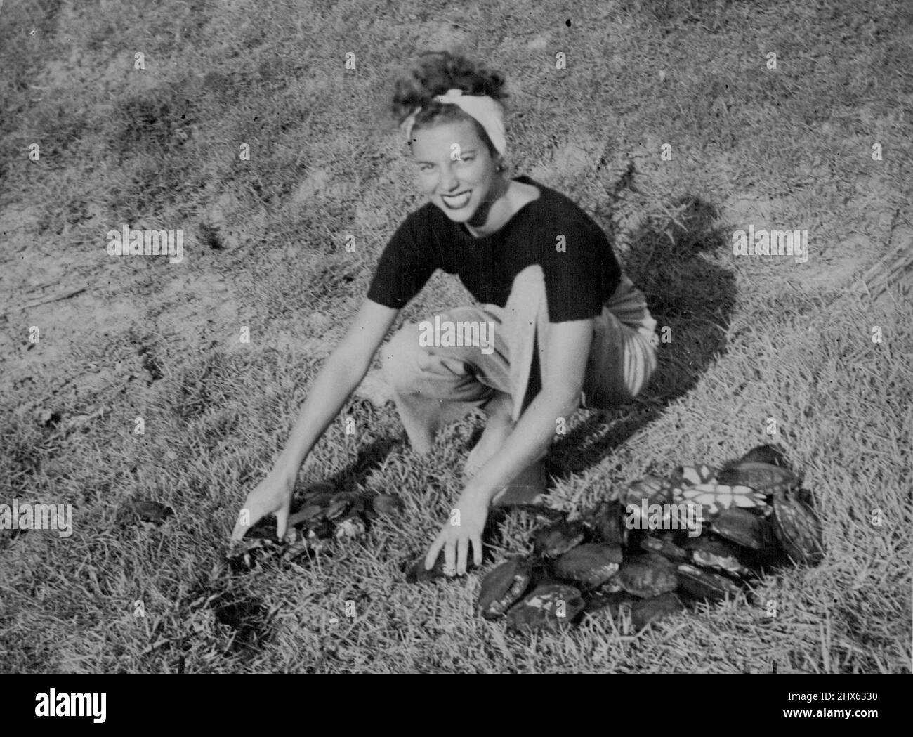 The young Mrs. Worrell, who is now used to such things takes (left ...