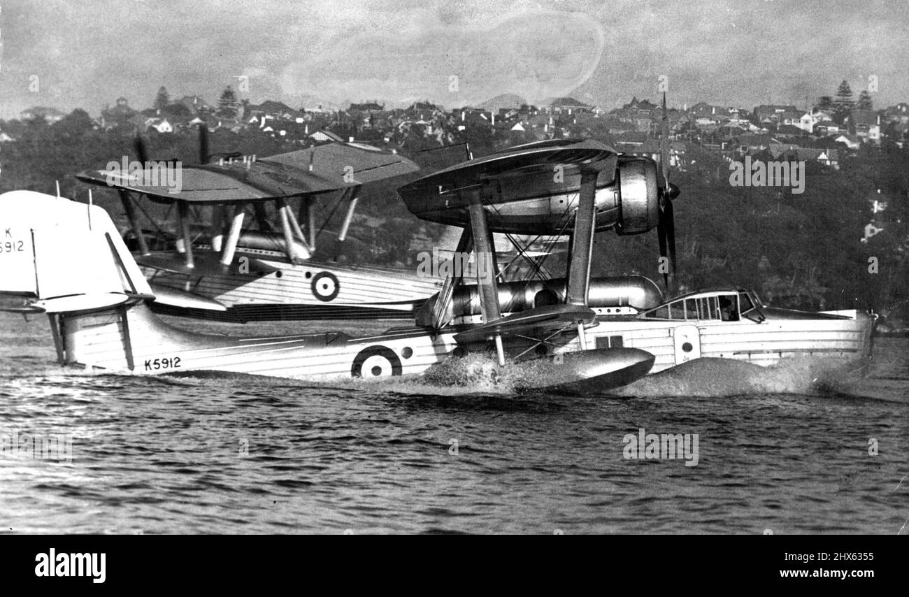 Flying-Boats Take Off. An unusual effect was produced when two of the ...