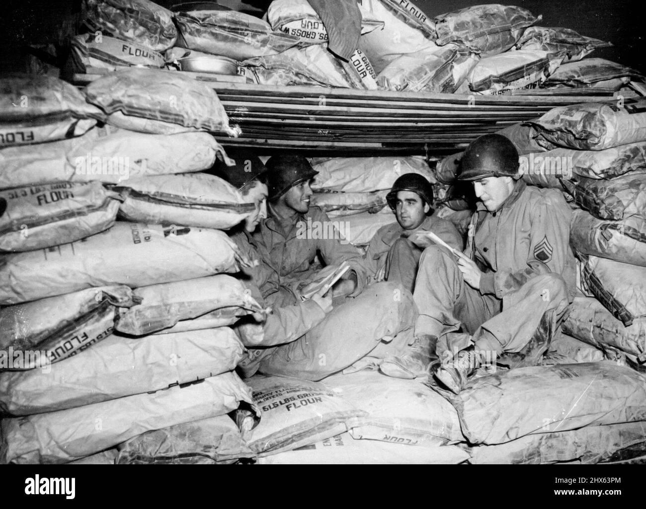 U.S. Soldiers Take Cover in Flour-Bag Shelter: Four U.S. soldiers ...