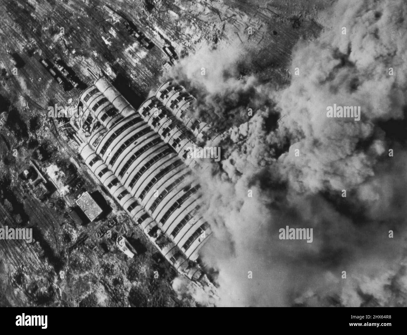 RAF Rips French Rail Yard -- Smoke billows up from bomb-smashed ...