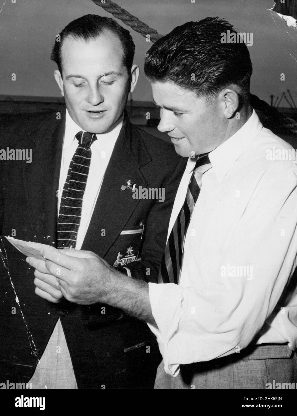 Kangaroos' lock - forward Harry Crocker (left), of Brisbane, and full ...
