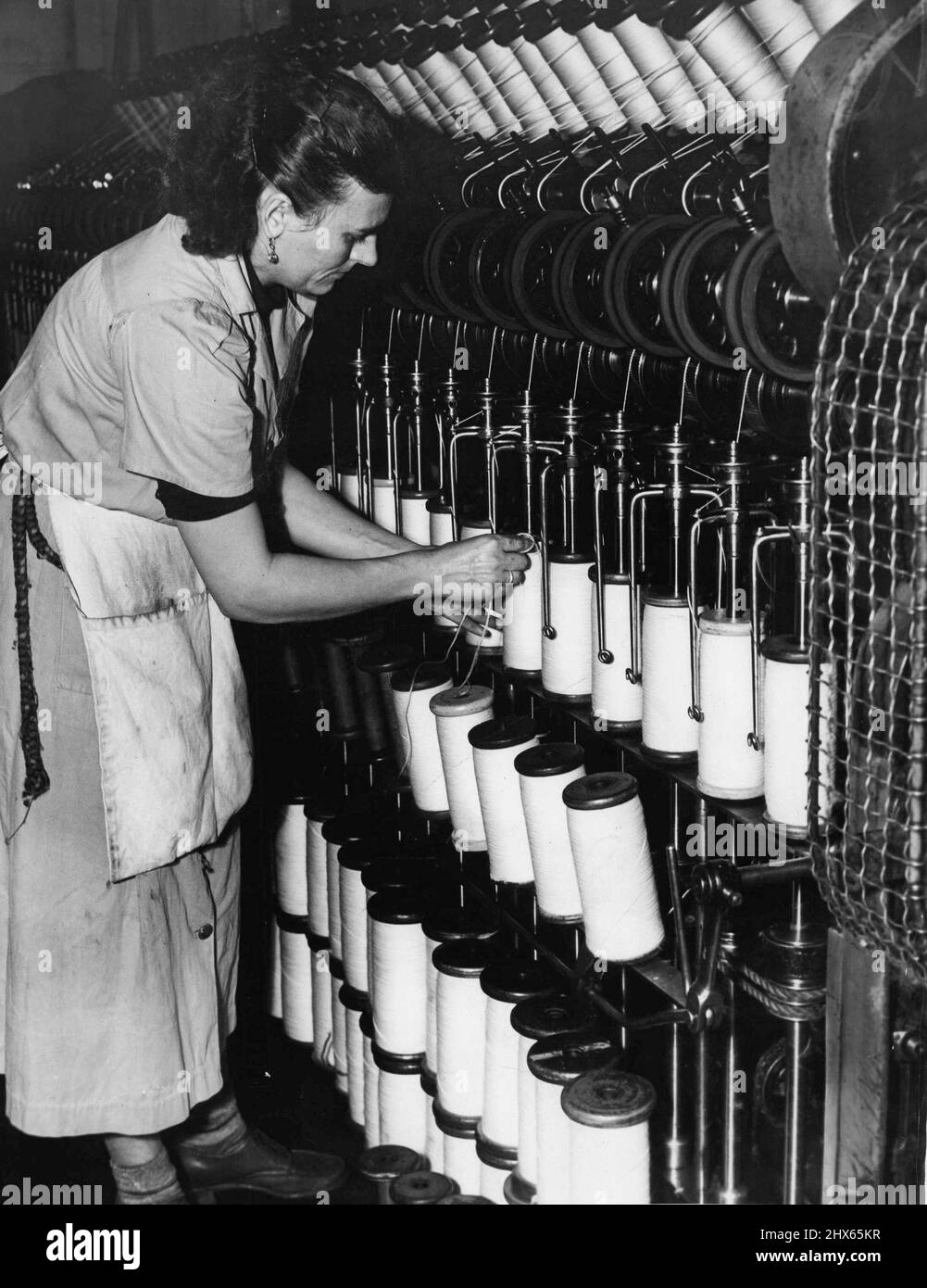 Scoured wool is cleaned in a "carding machine; wool fibres are ...