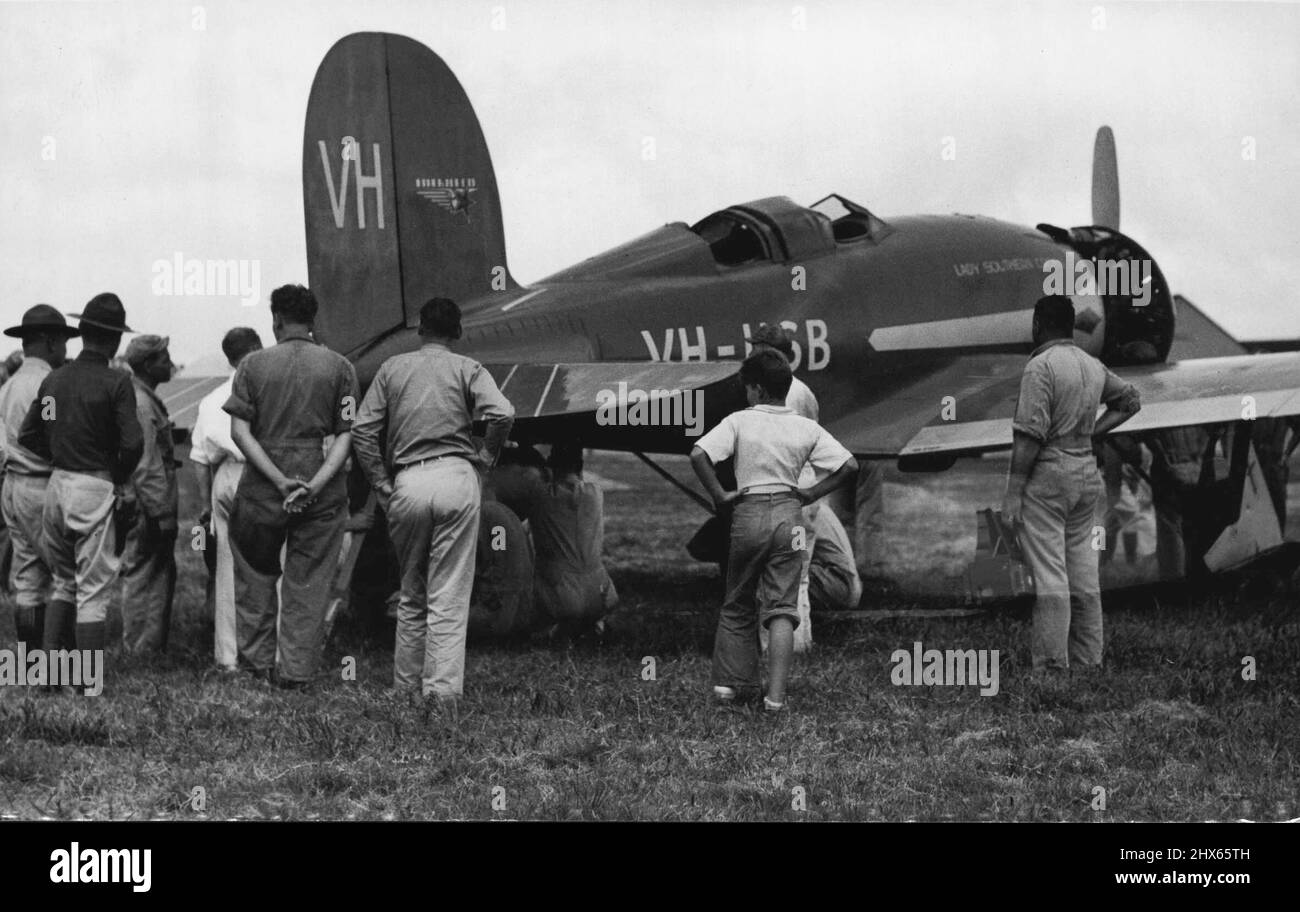 Skilled mechanics at Wheeler Field, U.S. Army airport, working on the ...