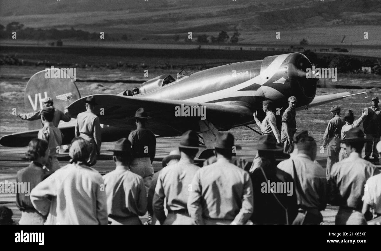 "Lady Southern Cross" touching the ground at Wheeler Field, Oahu. The ...