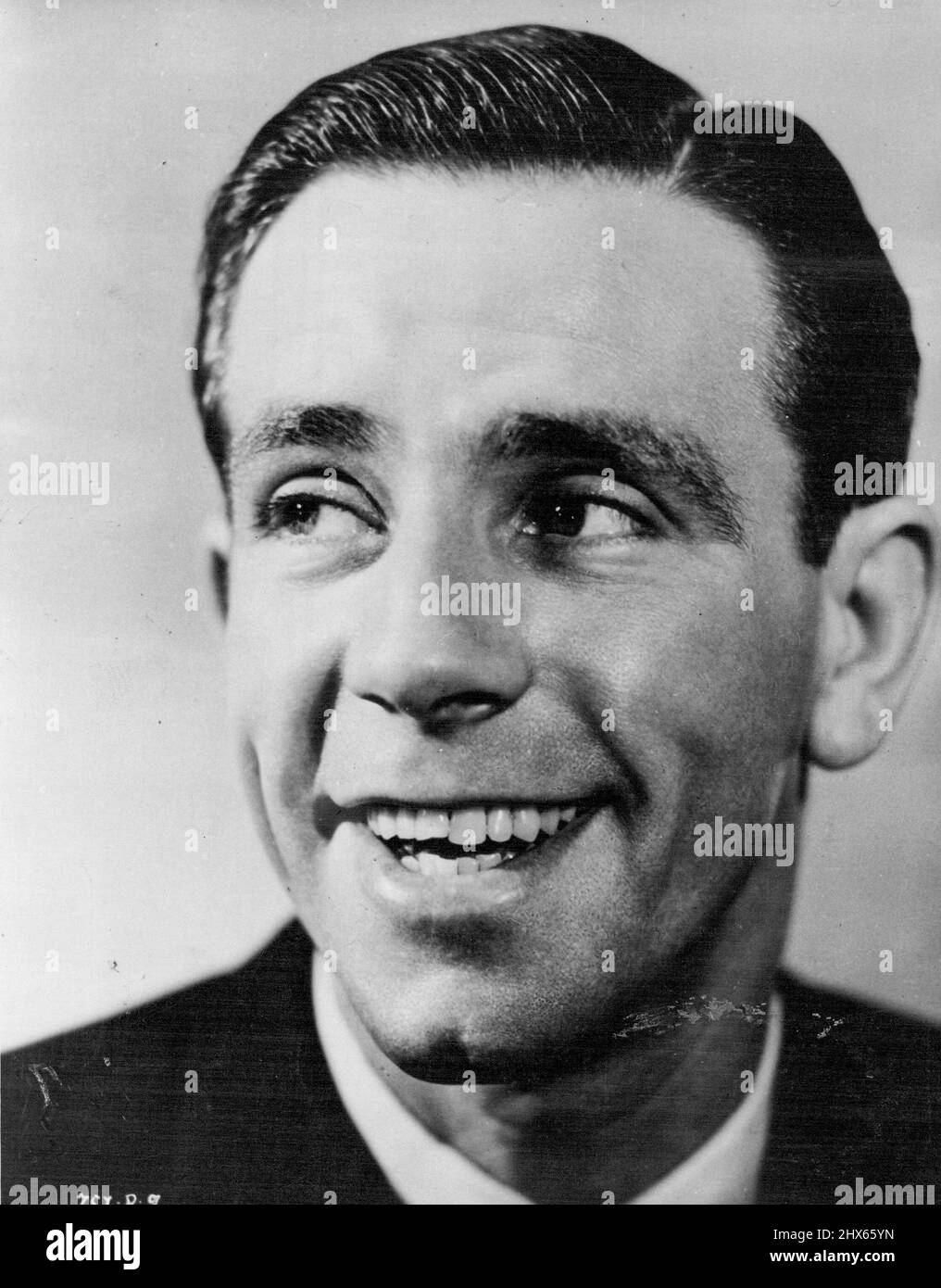 Norman Wisdom, British TV comedian, will be seen here soon in Trouble ...