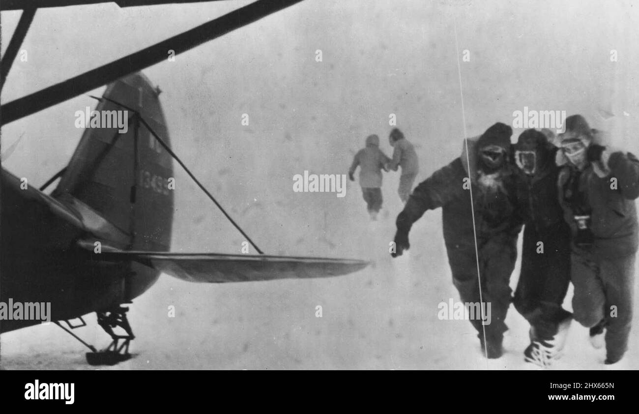 Airman Rescued In Far North -- An Air Force flier is shown being helped ...