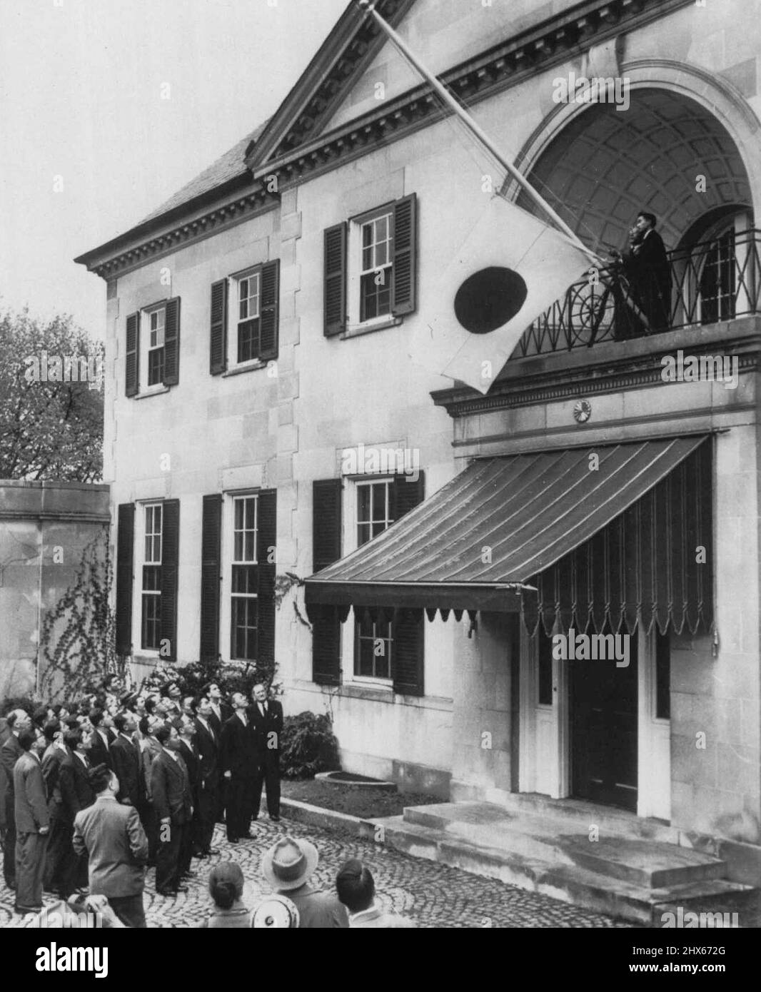 Japanese Raise Flag At Embassy -- The rising sun flag of Japan is ...