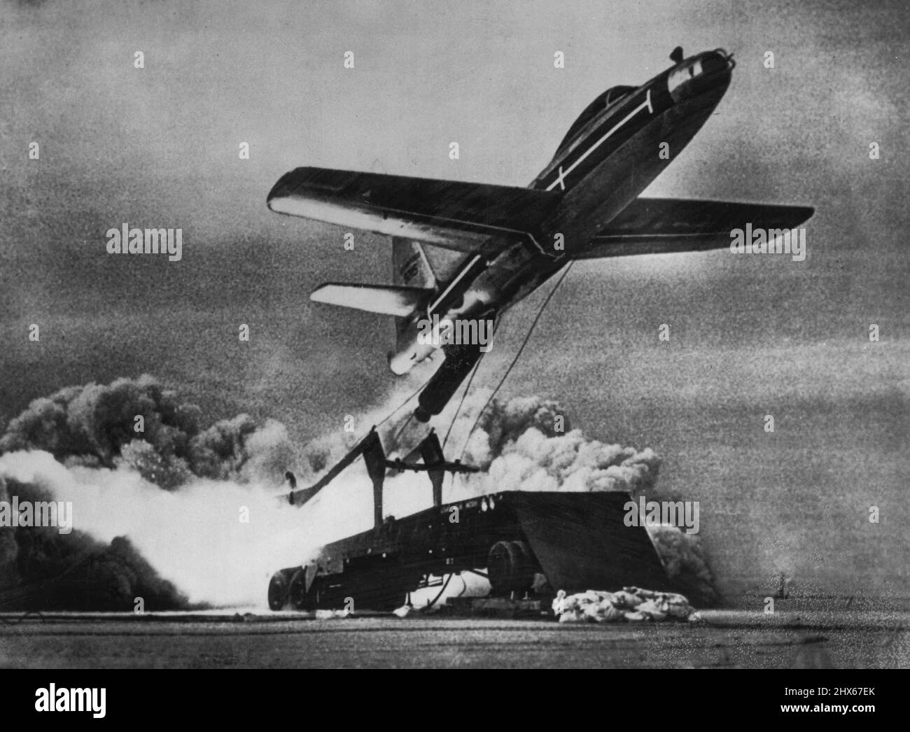A U.S. Air Force jet fighter zooms into the air like a guided missile ...